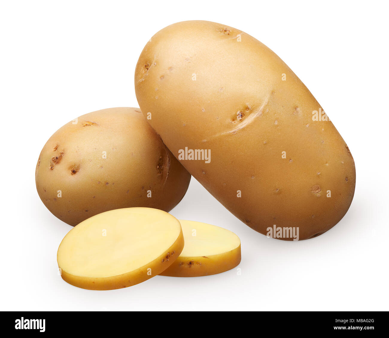Two whole fresh unpeeled potatoes and two chopped pieces isolated on ...