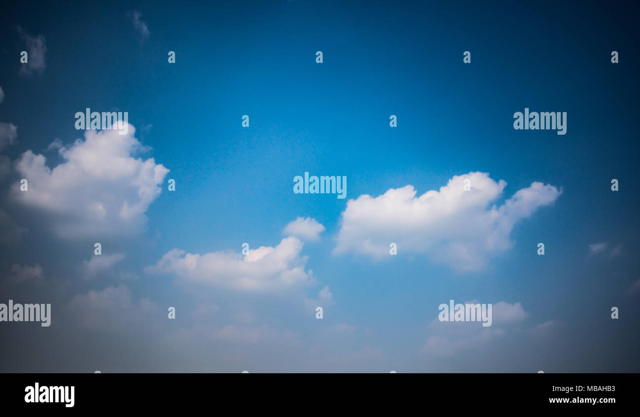 Blue color cloud view looking haven in summer season Stock Photo - Alamy