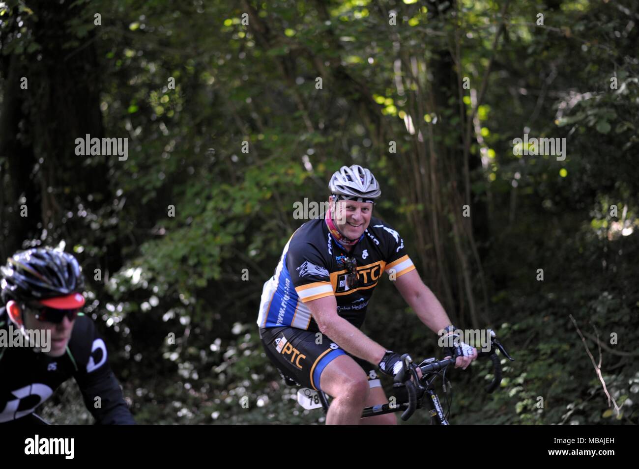 Group of cyclists on endurance road race Stock Photo - Alamy