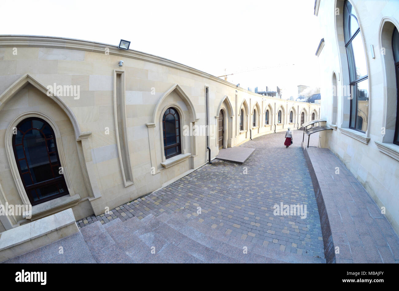 A courtyard of the mosque. Wooden door to the Ar-Rahma Mosque (Mercy ...