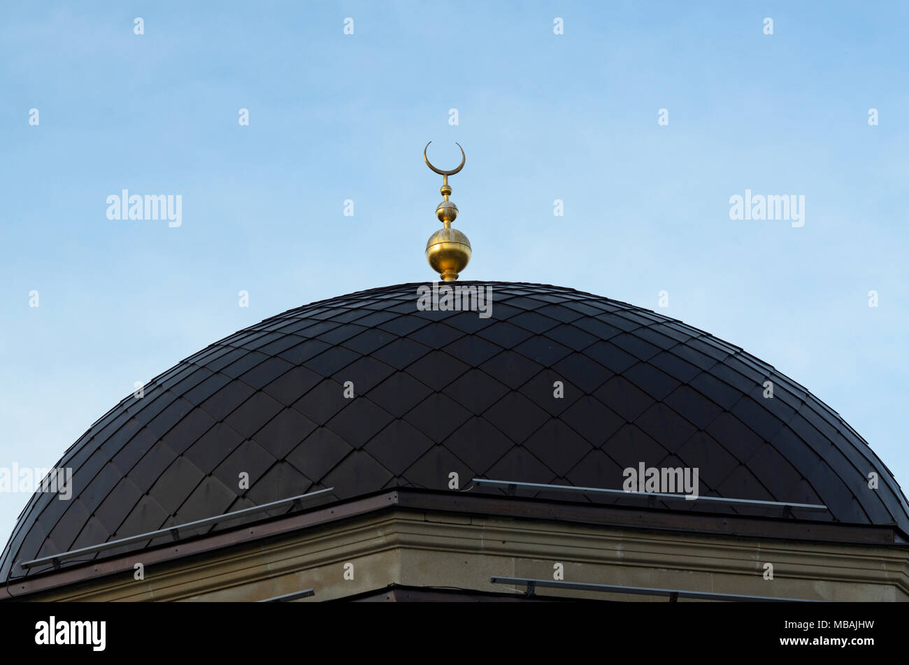 Dome of mosque with a signs of crescent and star. The Ar-Rahma Mosque ...