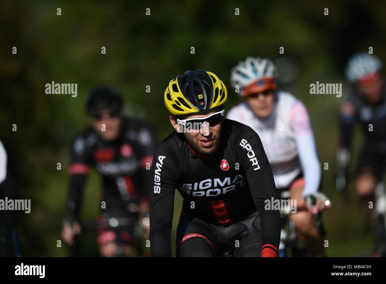 Group of cyclists on endurance road race Stock Photo - Alamy