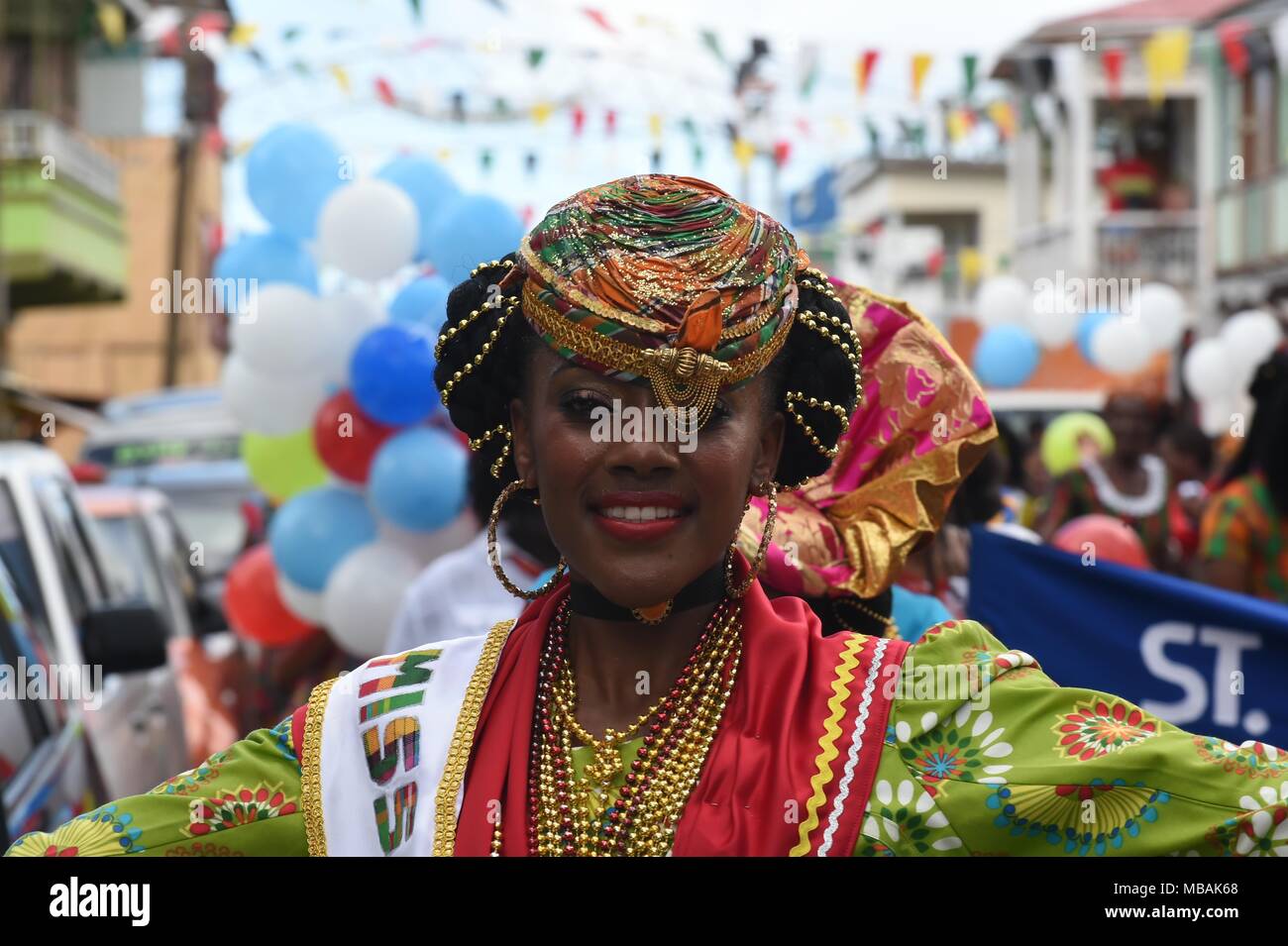 Carnival in the caribbean island of dominica, women in national costume ...