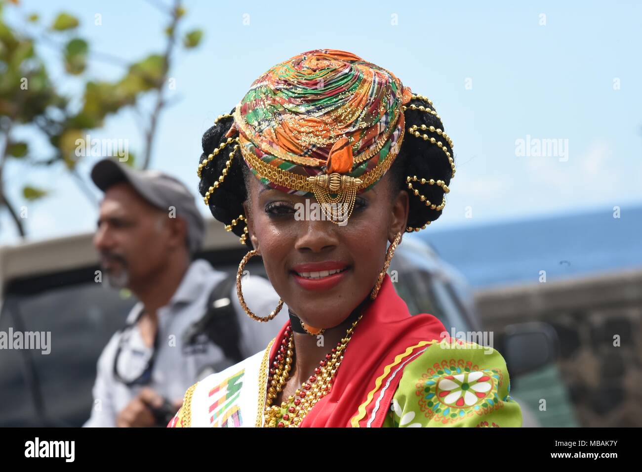 Carnival in the caribbean island of dominica, women in national costume ...