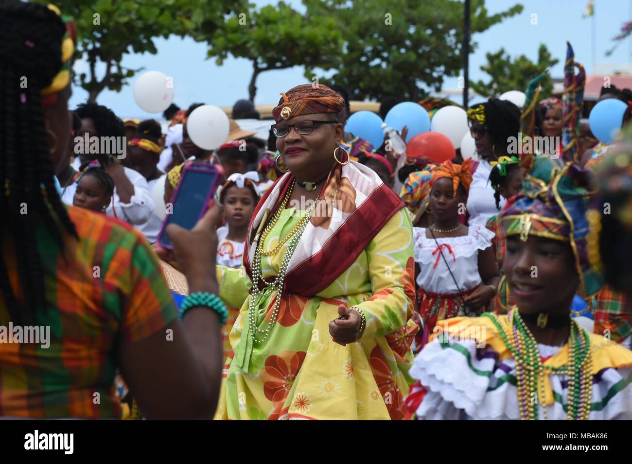 Carnival in the caribbean island of dominica, women in national costume ...