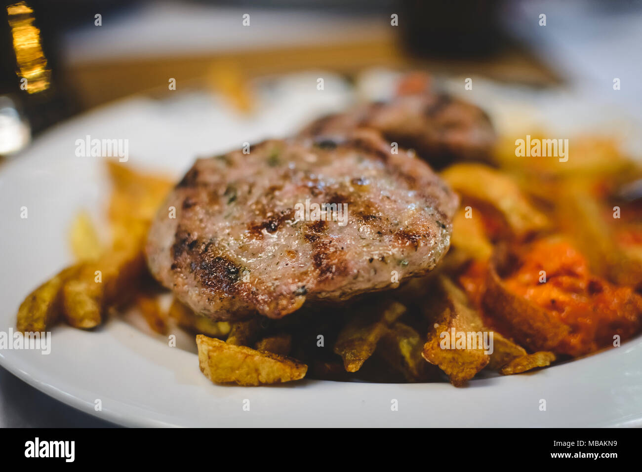 bulgaria traditional meat ball kufte with french fries and lutenitsa ...