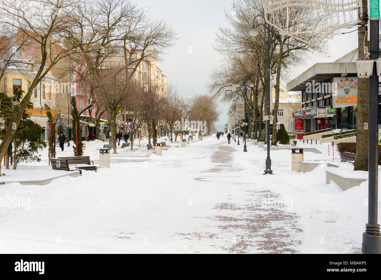 VARNA, BULGARIA,FEBRUARY 28, 2018: unknown person walking in the snowy ...