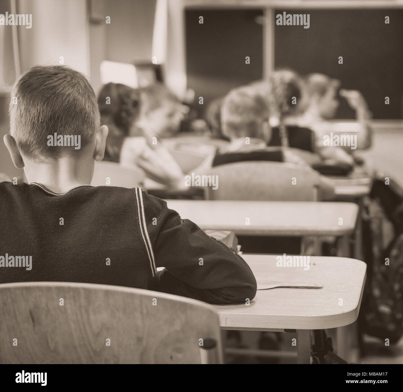 Children in class at school. Back view Stock Photo - Alamy