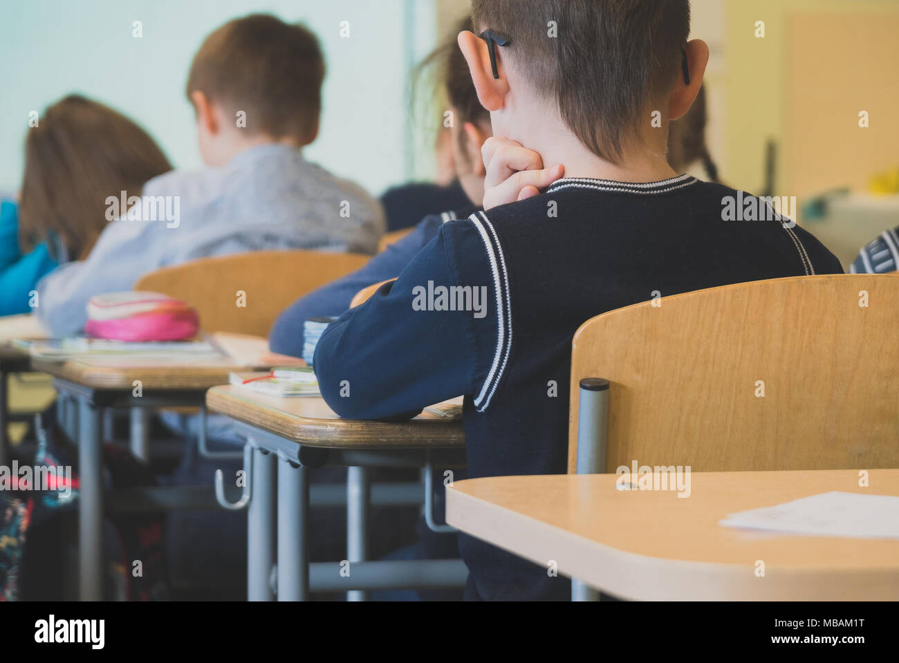 Children in class at school. Back view Stock Photo - Alamy