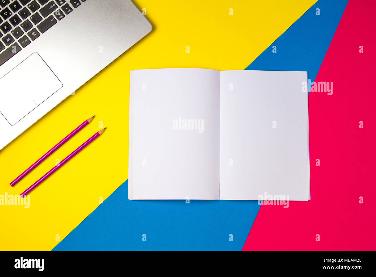 Top view office table desk. Workspace with laptop and open notebook ...