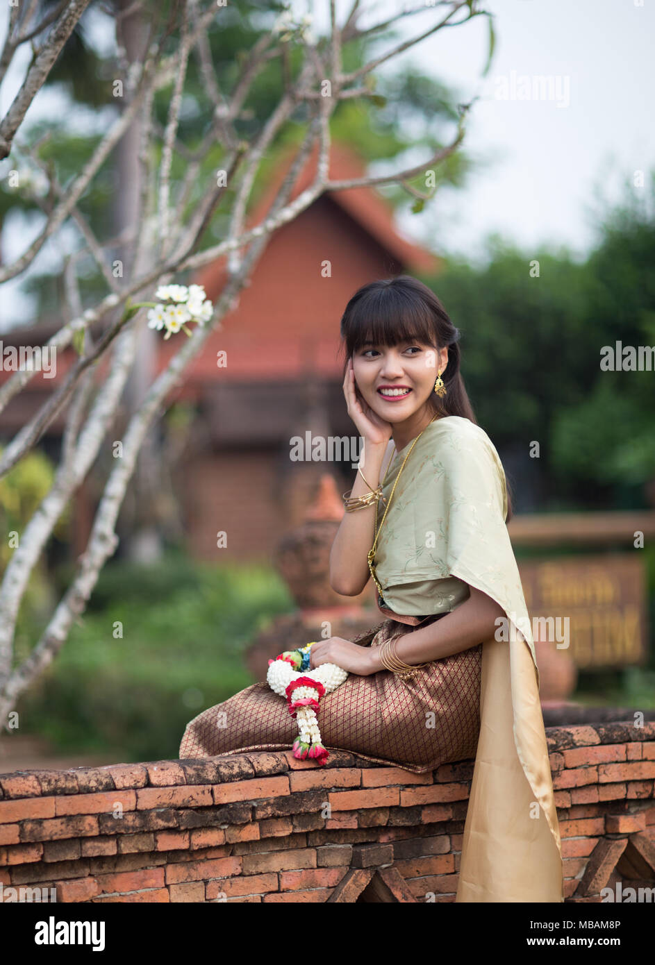 Nice and charming young Thai girl with Thai ancient style dressing ...