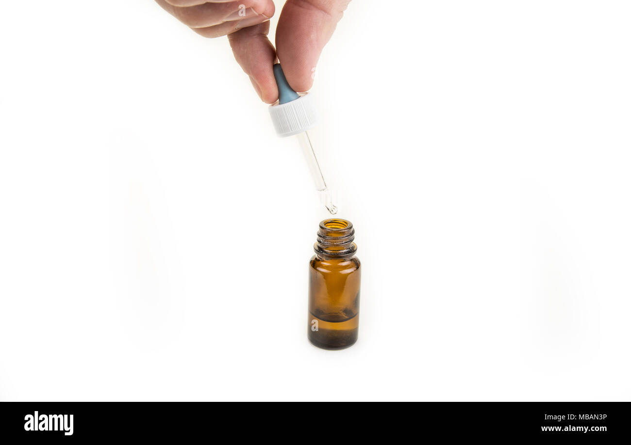 A bottle of nose drops for the cold treatment Stock Photo - Alamy