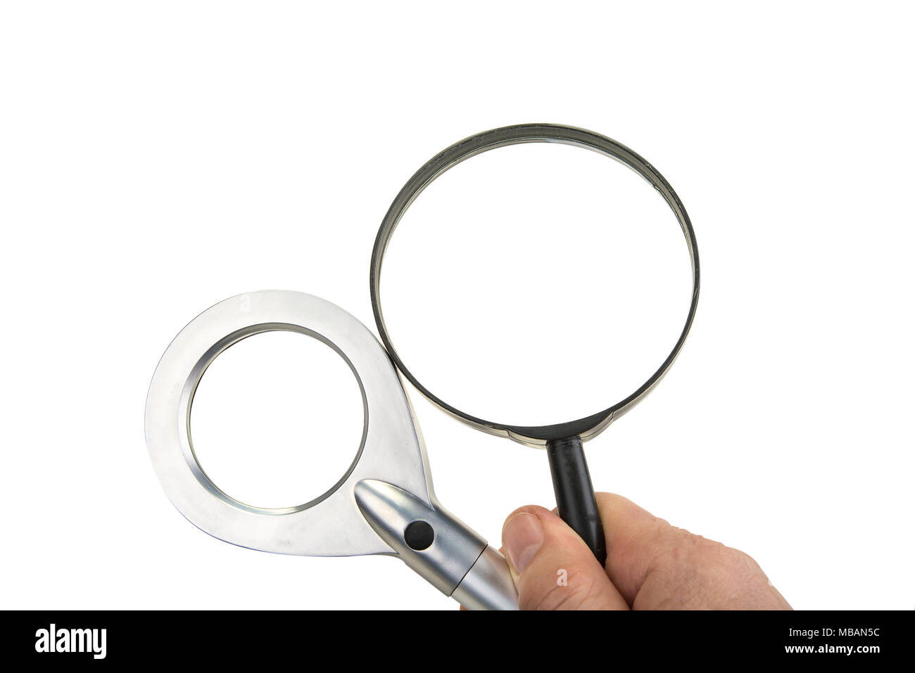 Magnifying glass in the hand on the white Stock Photo - Alamy