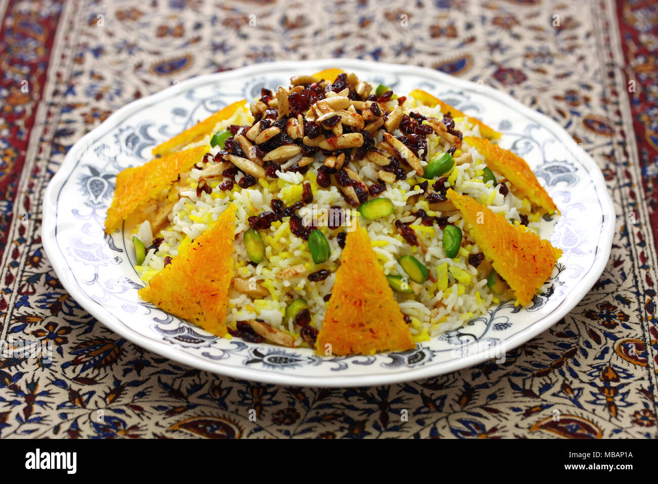 zereshk polo with tahdig, saffron barberry rice with scorched rice ...