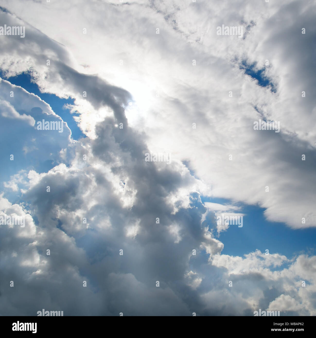 sun on beautiful blue sky Stock Photo - Alamy