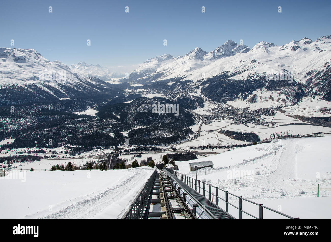 A funicular railway takes over the 700-meter climb from Punt Muragl up ...