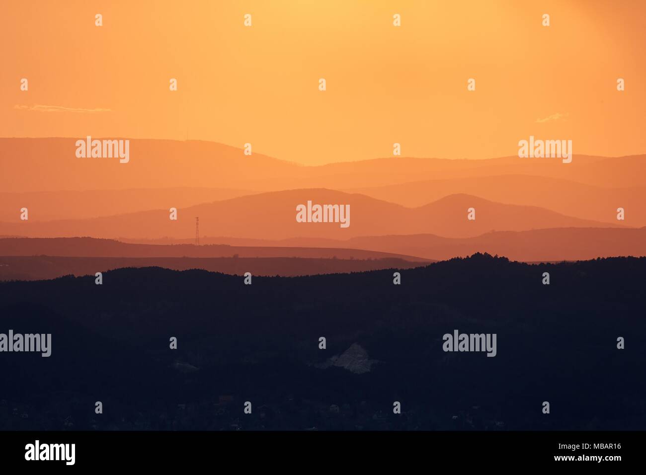 Sunset Hilly Landscape Stock Photo - Alamy