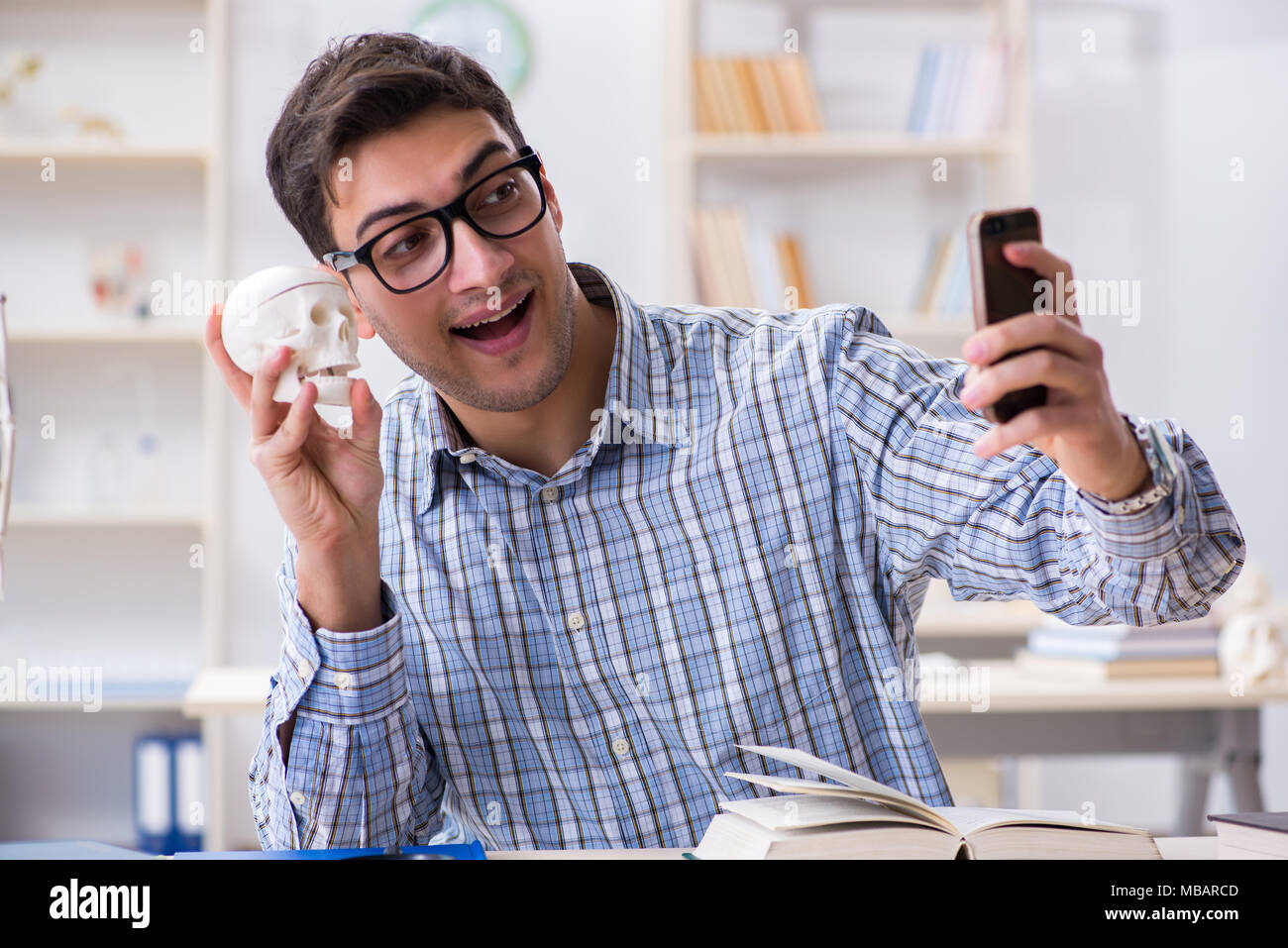 Medical student studying in classroom Stock Photo - Alamy