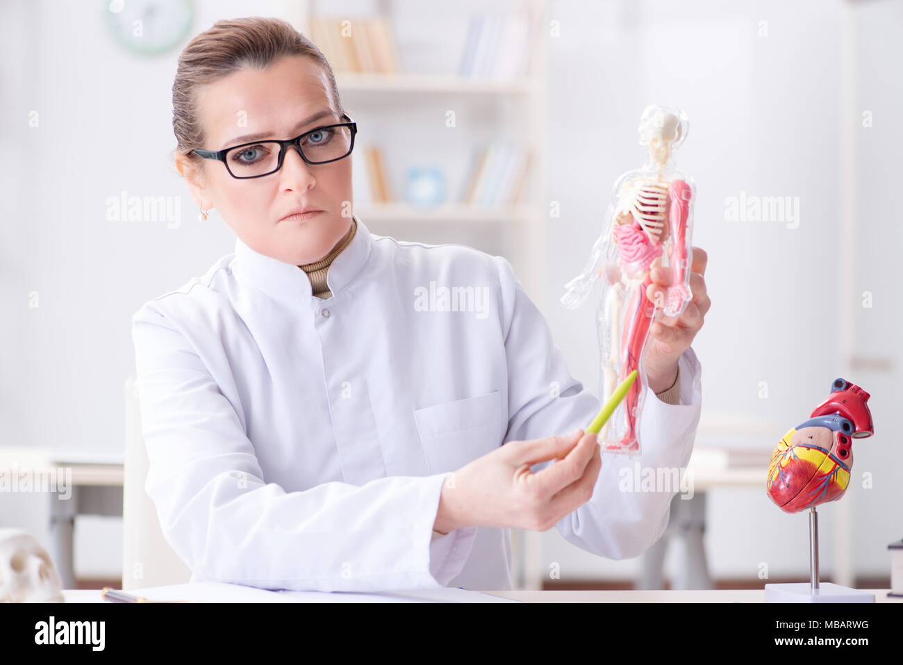 Doctor lecturer explaining various parts of heart Stock Photo - Alamy