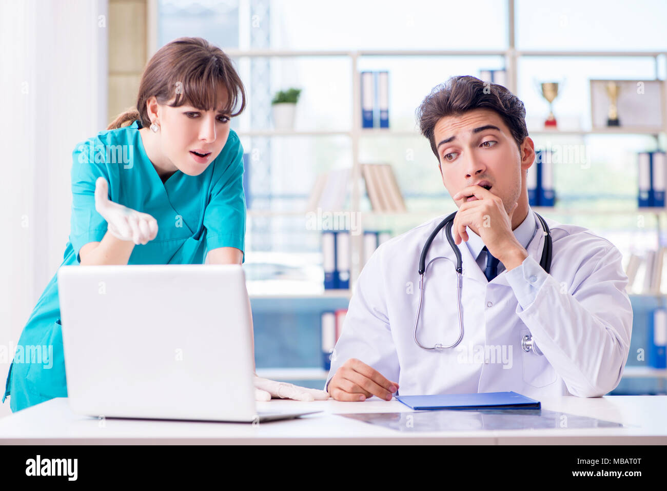 Doctor angry at his assistant due to medical error Stock Photo - Alamy