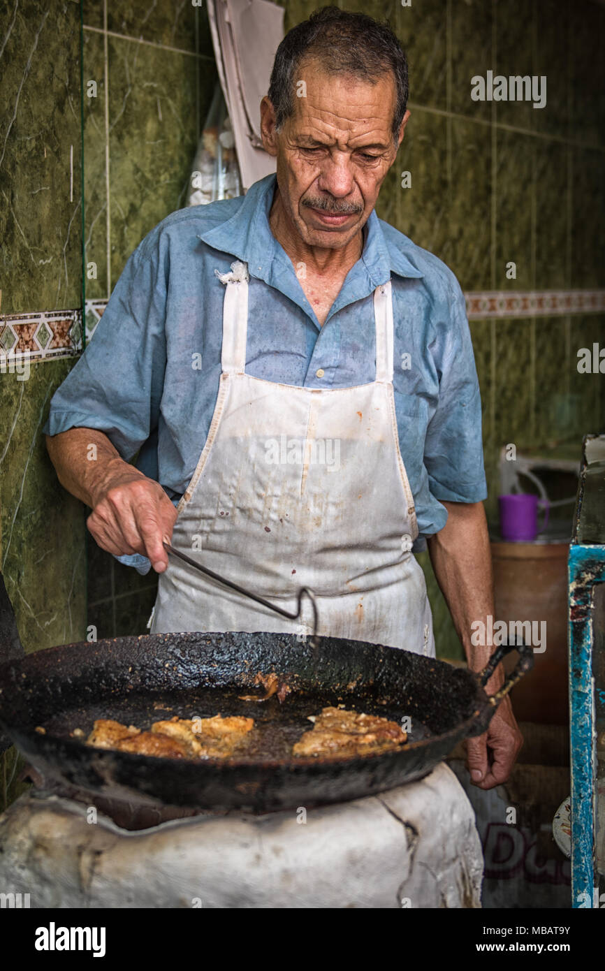 Moroccan man grilling meat hi-res stock photography and images - Alamy
