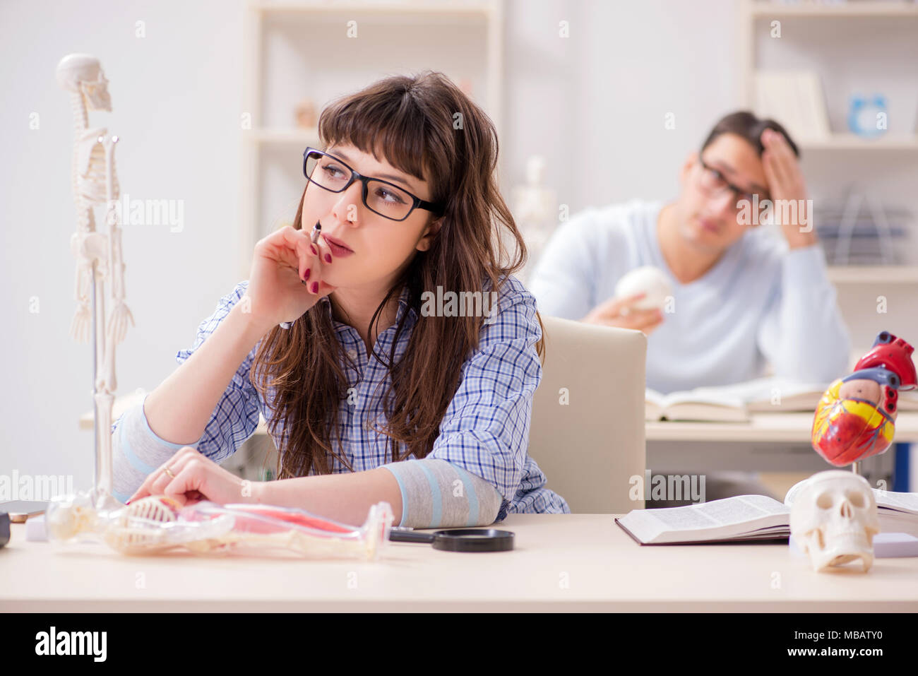 Two medical students studying in classroom Stock Photo - Alamy