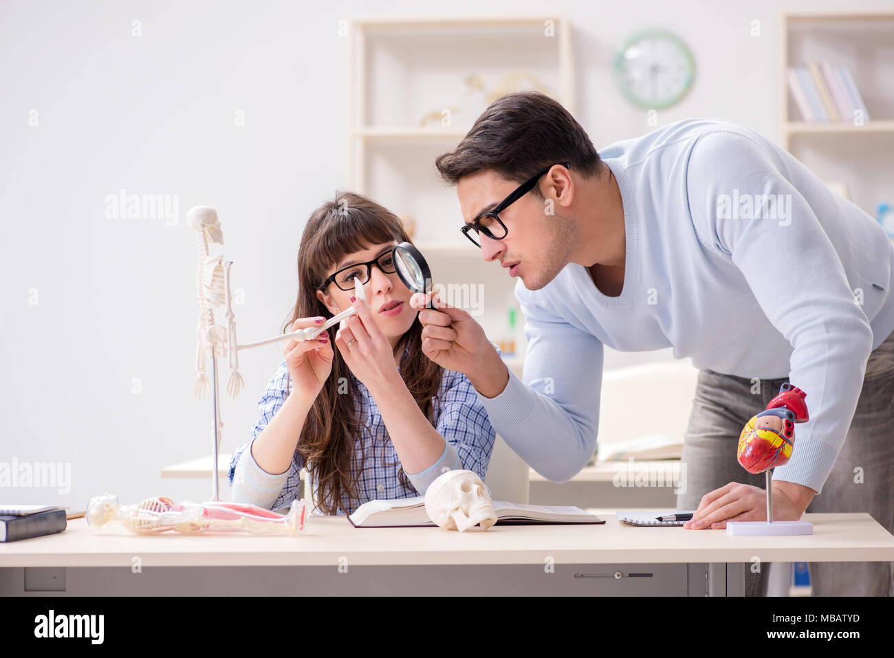 Two medical students studying in classroom Stock Photo - Alamy
