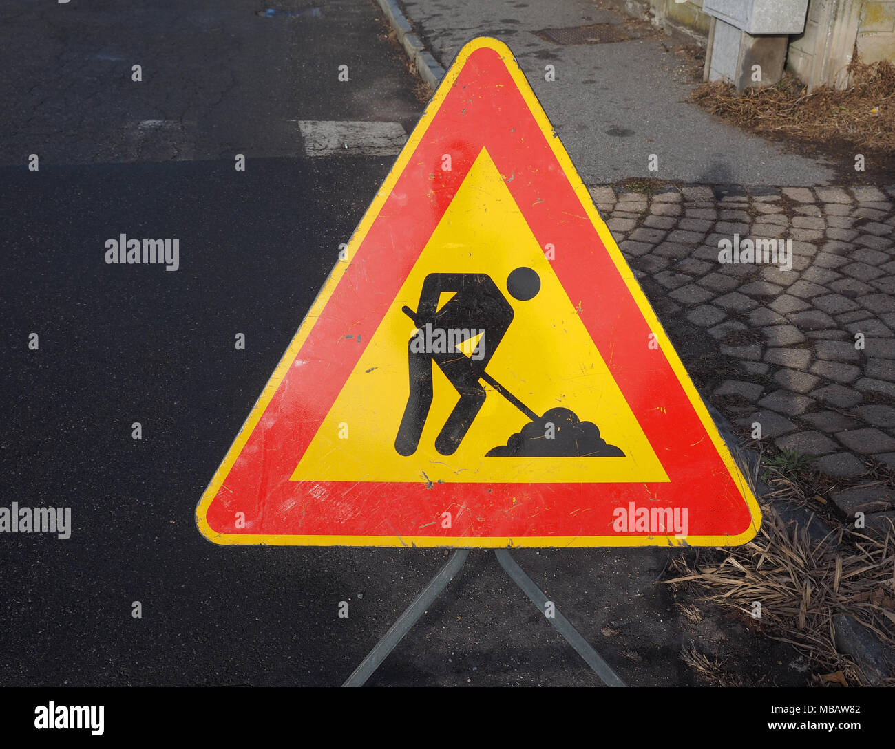 Warning signs, men at work road works traffic sign Stock Photo - Alamy