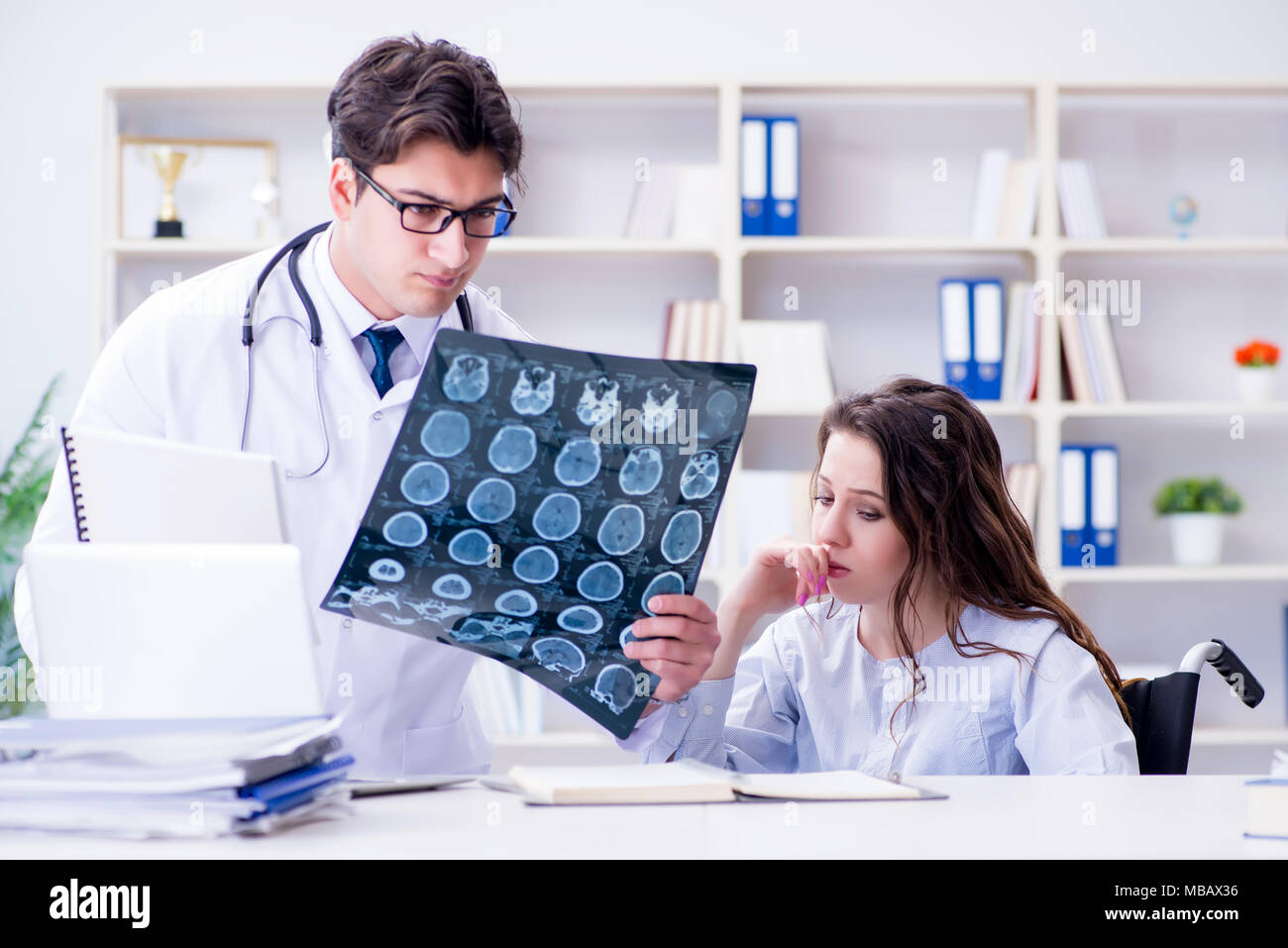 Doctor feeling pessimistic about x-ray image of patient Stock Photo - Alamy