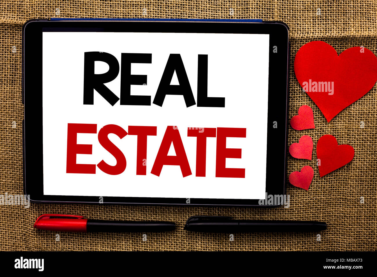 Handwriting text writing Real Estate. Concept meaning Residential ...