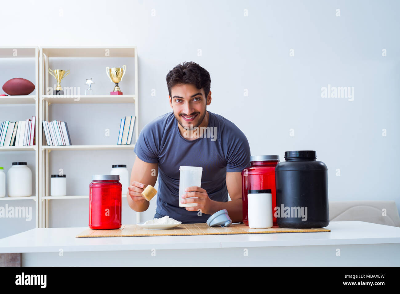 Athlete tasting new protein supplements for better muscles Stock Photo ...