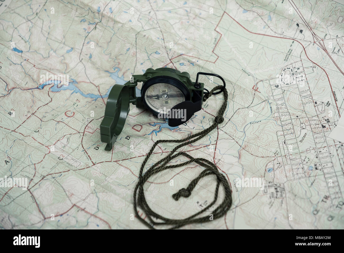compass and map reading survival outdoors Stock Photo - Alamy