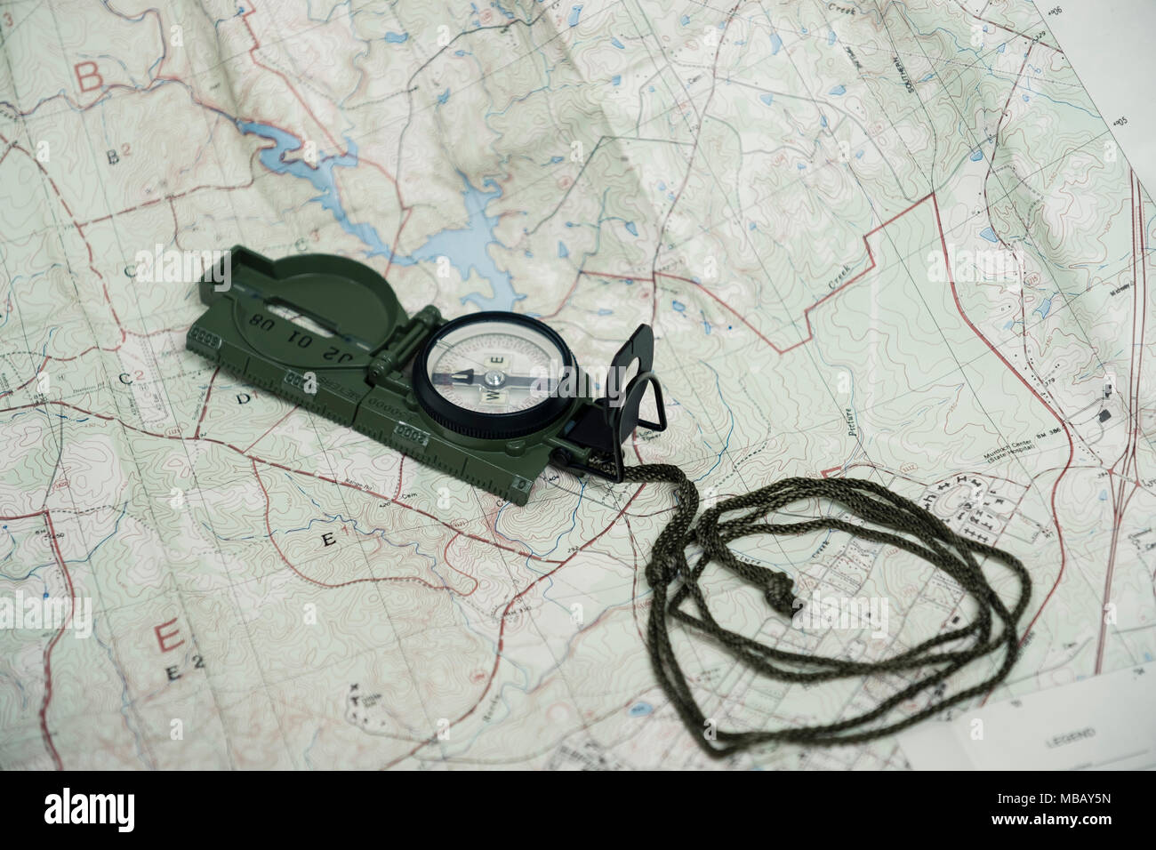 compass and map reading survival outdoors Stock Photo - Alamy