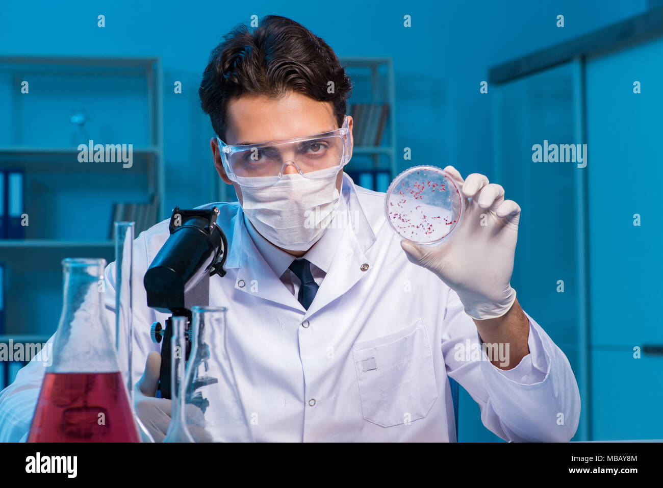 Chemistry assistant working in the chemical lab Stock Photo - Alamy