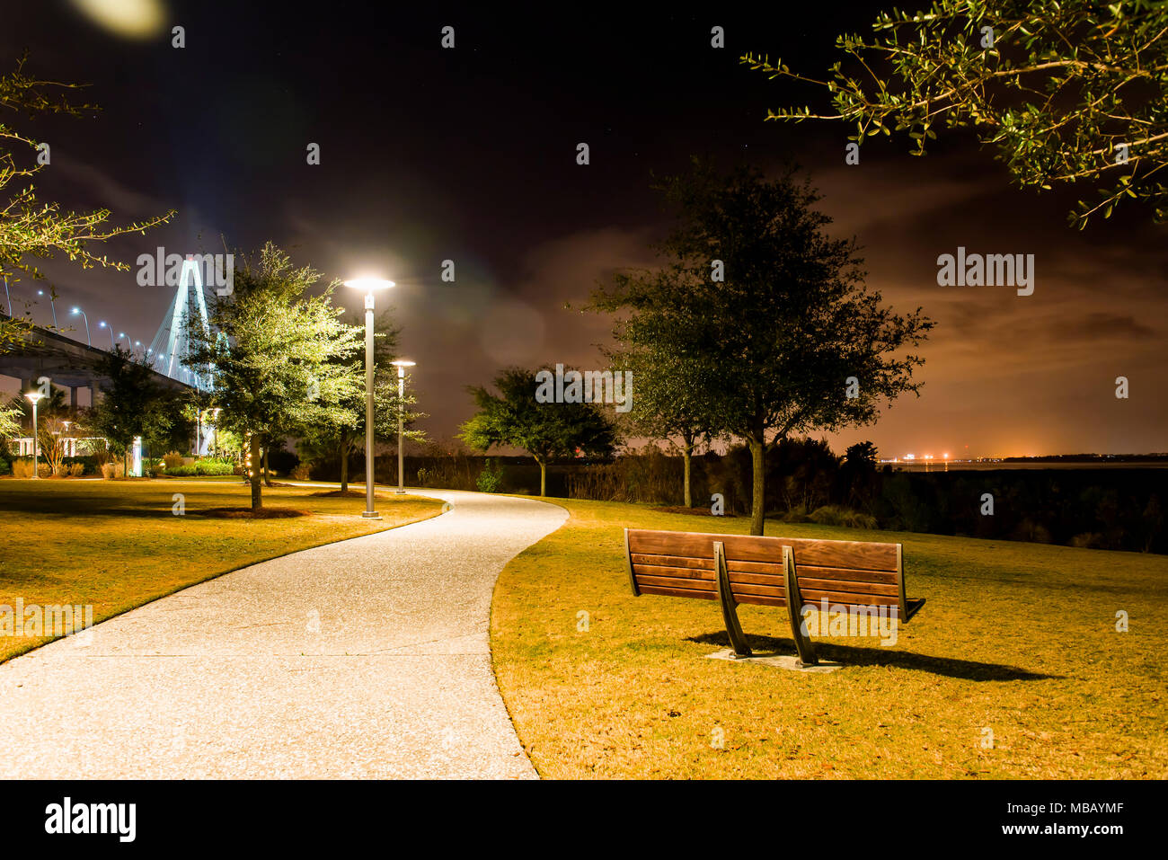 Stylish bench in summer park Stock Photo - Alamy