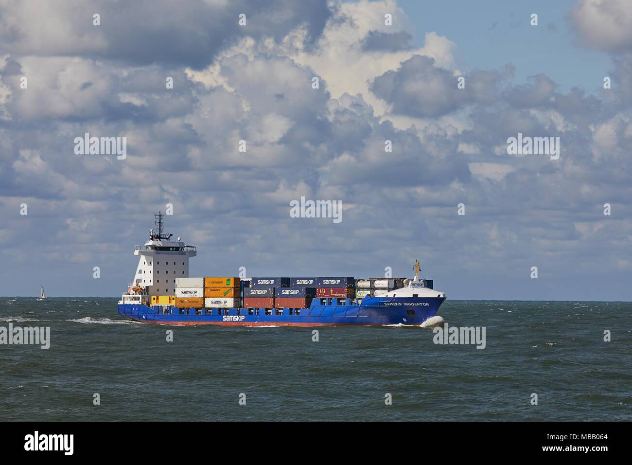 Ship carrying containers onboard Stock Photo - Alamy