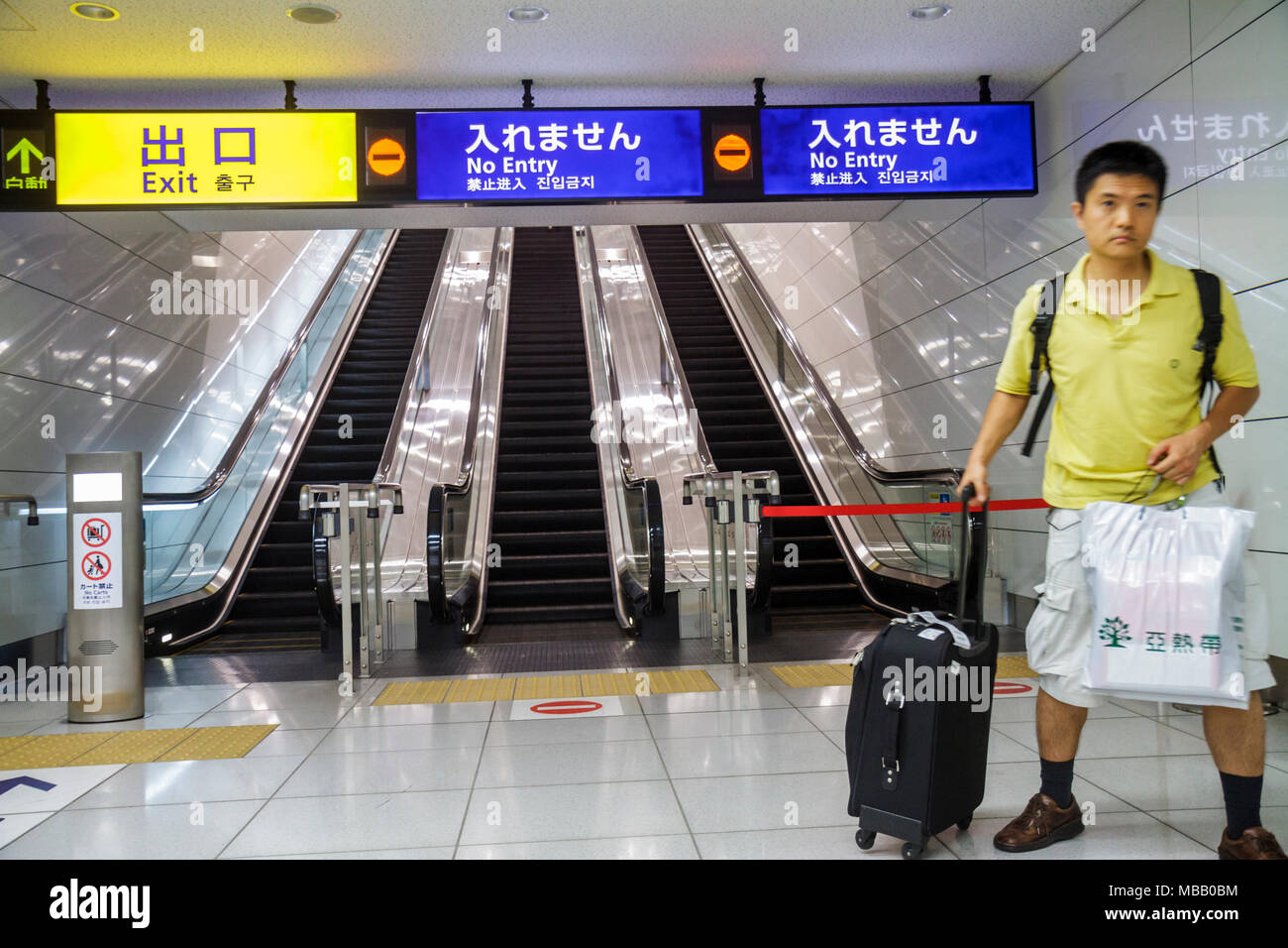 Tokyo Japan,Asia,Orient,Haneda Airport,escalator,English and Japanese ...