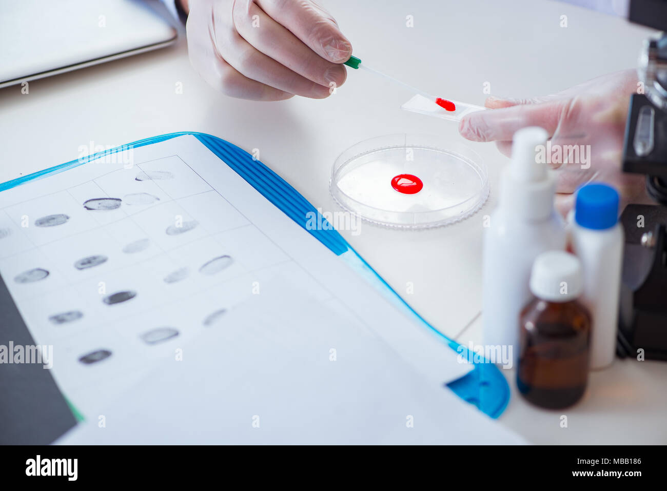 Drug synthesis lab experimentnig with pills Stock Photo - Alamy