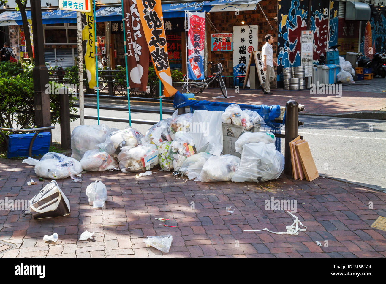 Trash On Street Corner High Resolution Stock Photography and Images - Alamy