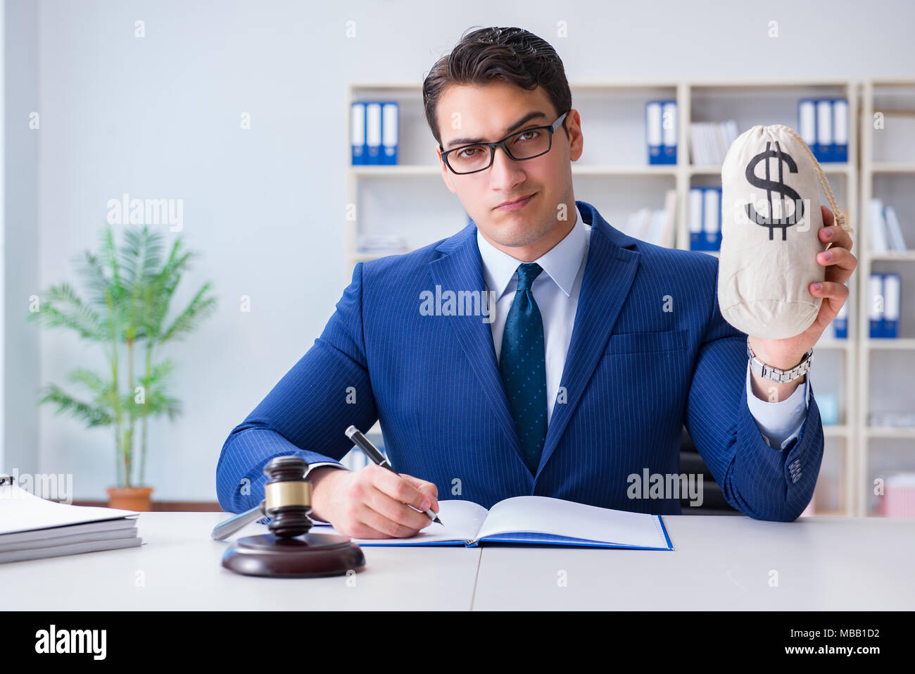 Money bag judge gavel hi-res stock photography and images - Alamy