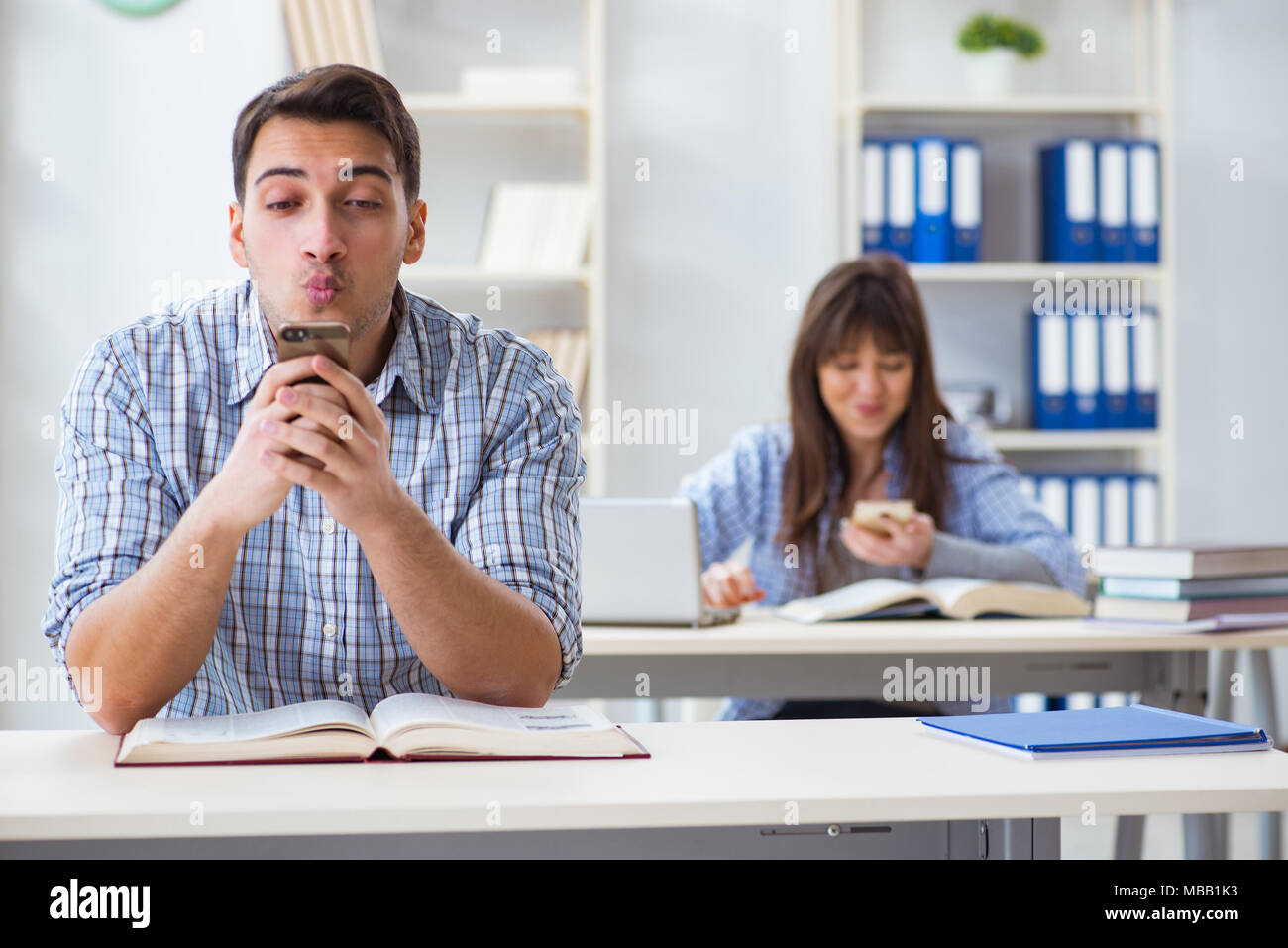 Students sitting and studying in classroom college Stock Photo - Alamy