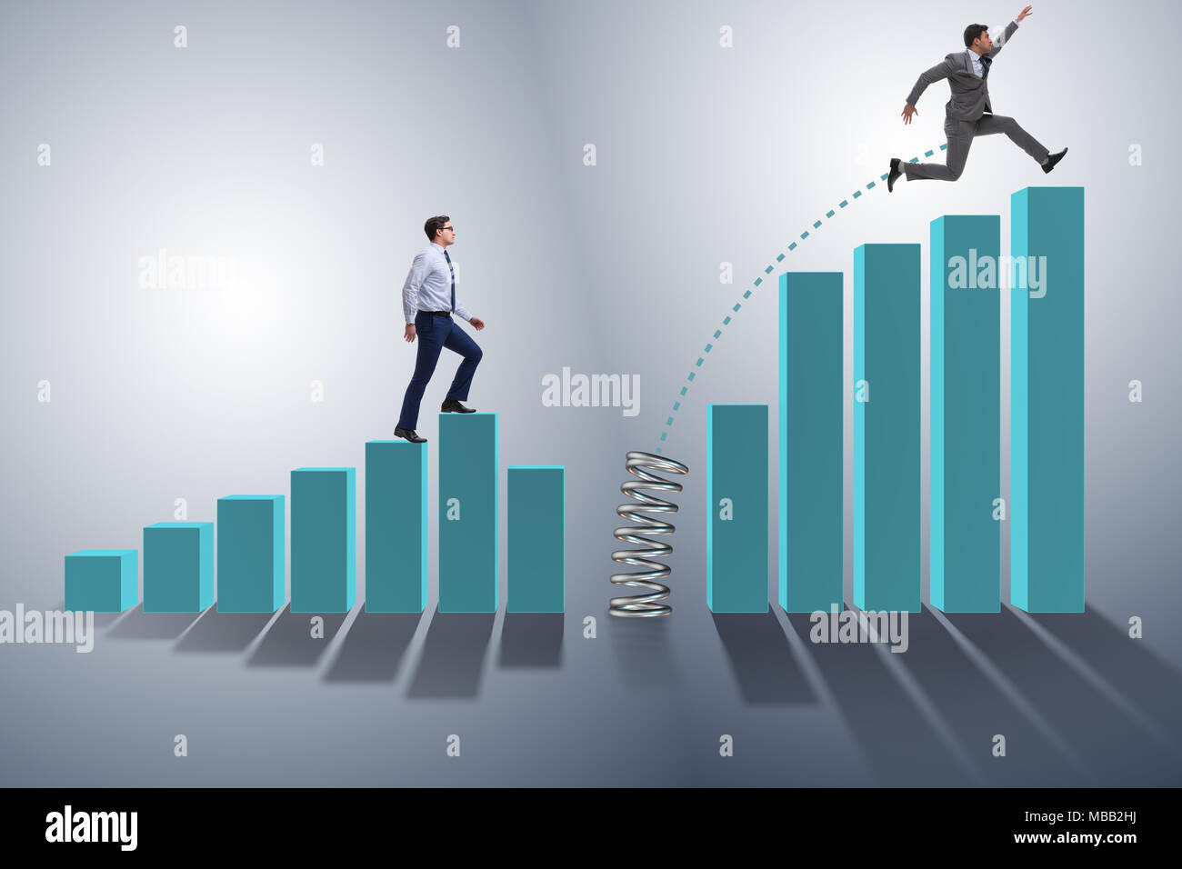 Business people jumping over bar charts Stock Photo - Alamy