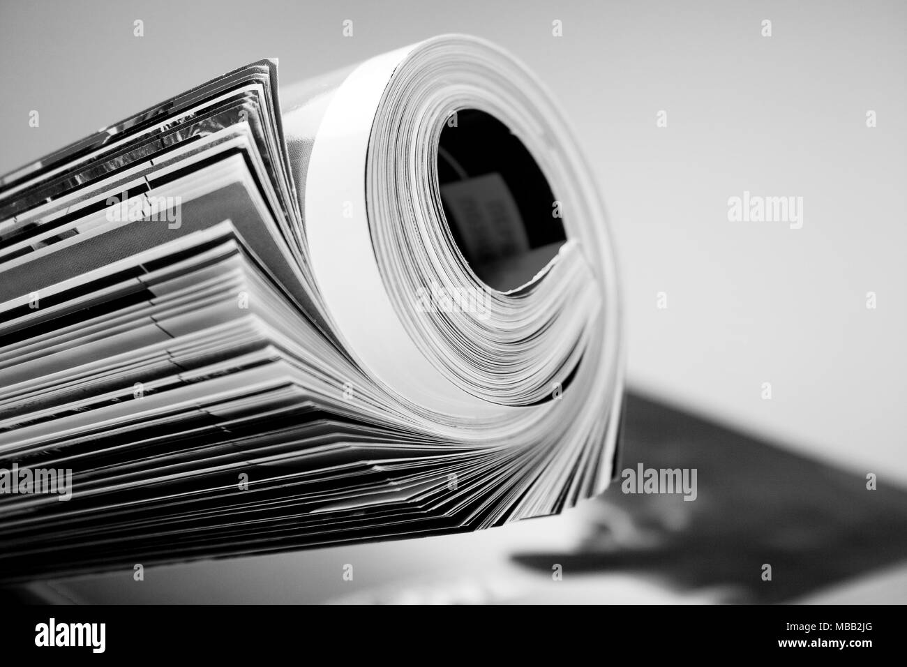 rolled up magazine Stock Photo - Alamy