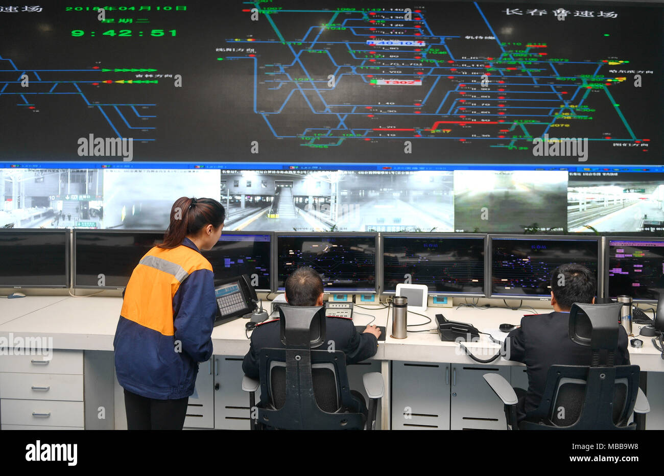 Changchun. 10th Apr, 2018. Railway staff members work at a ...