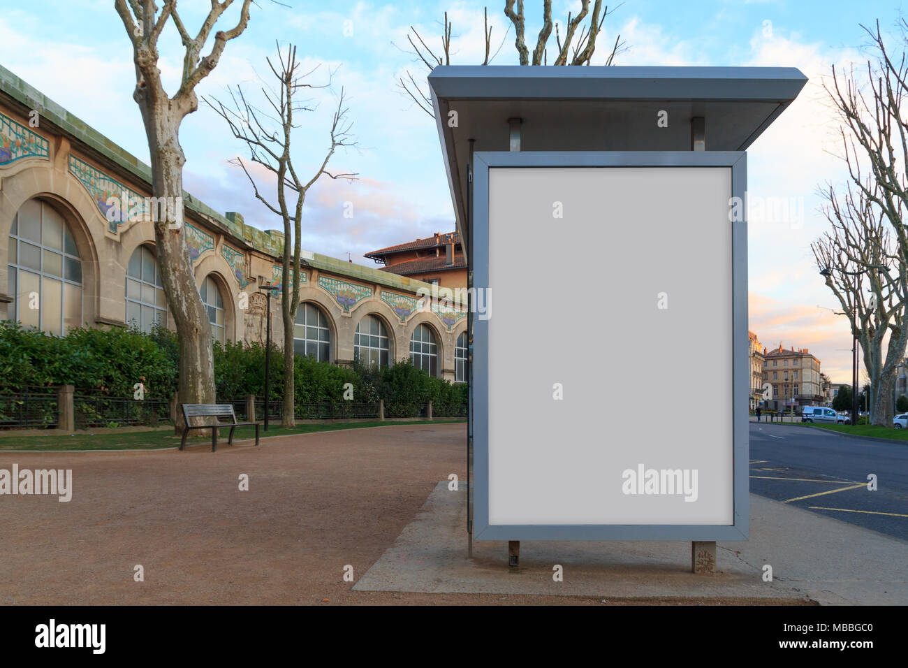 Blank advertisement mock up in a bus stop in the street Stock Photo - Alamy
