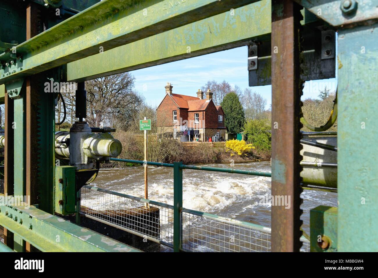 The River Wey in flood at Walsham weir Ripley Surrey England UK Stock ...