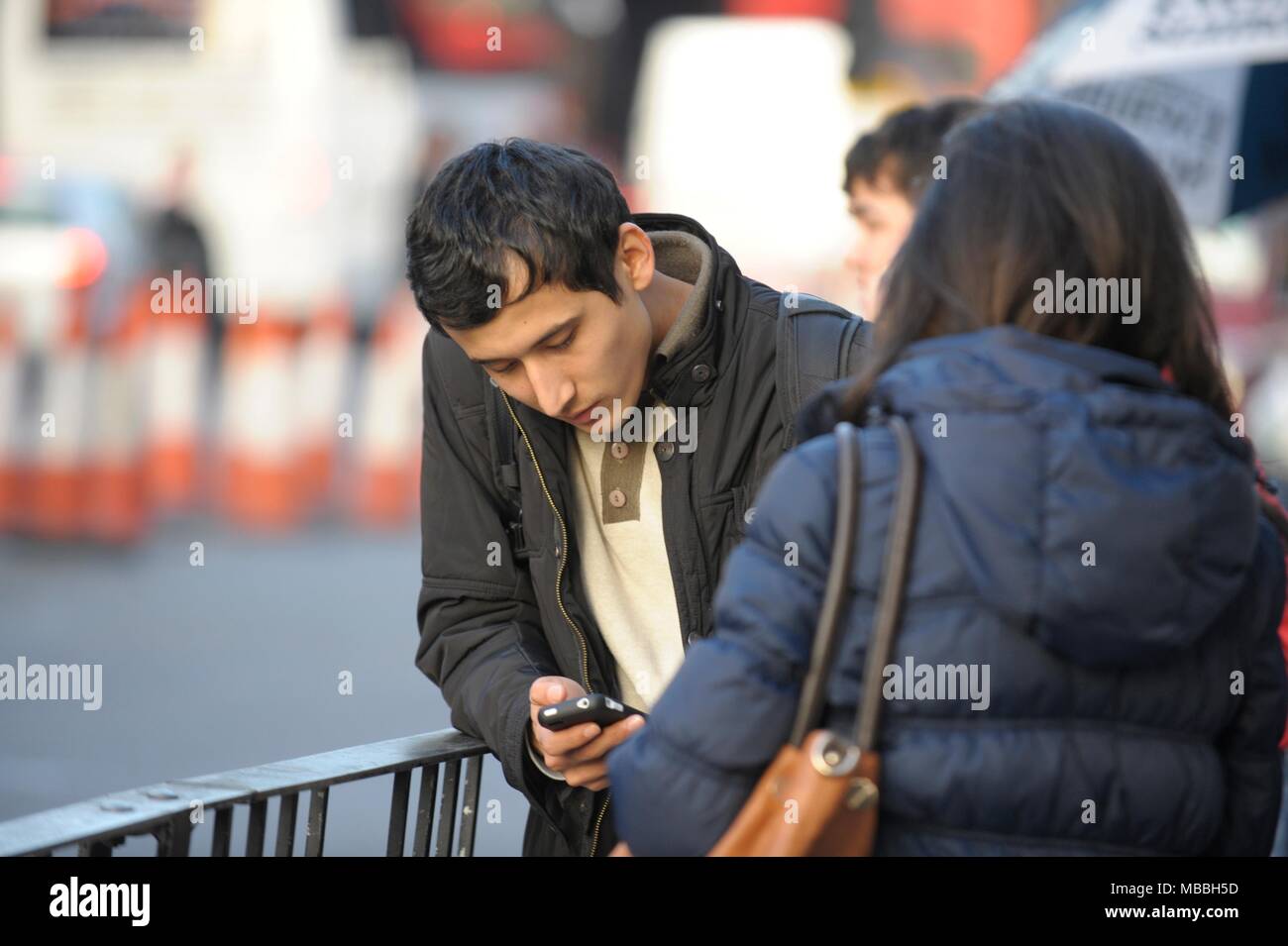 People on their cellphones Stock Photo - Alamy