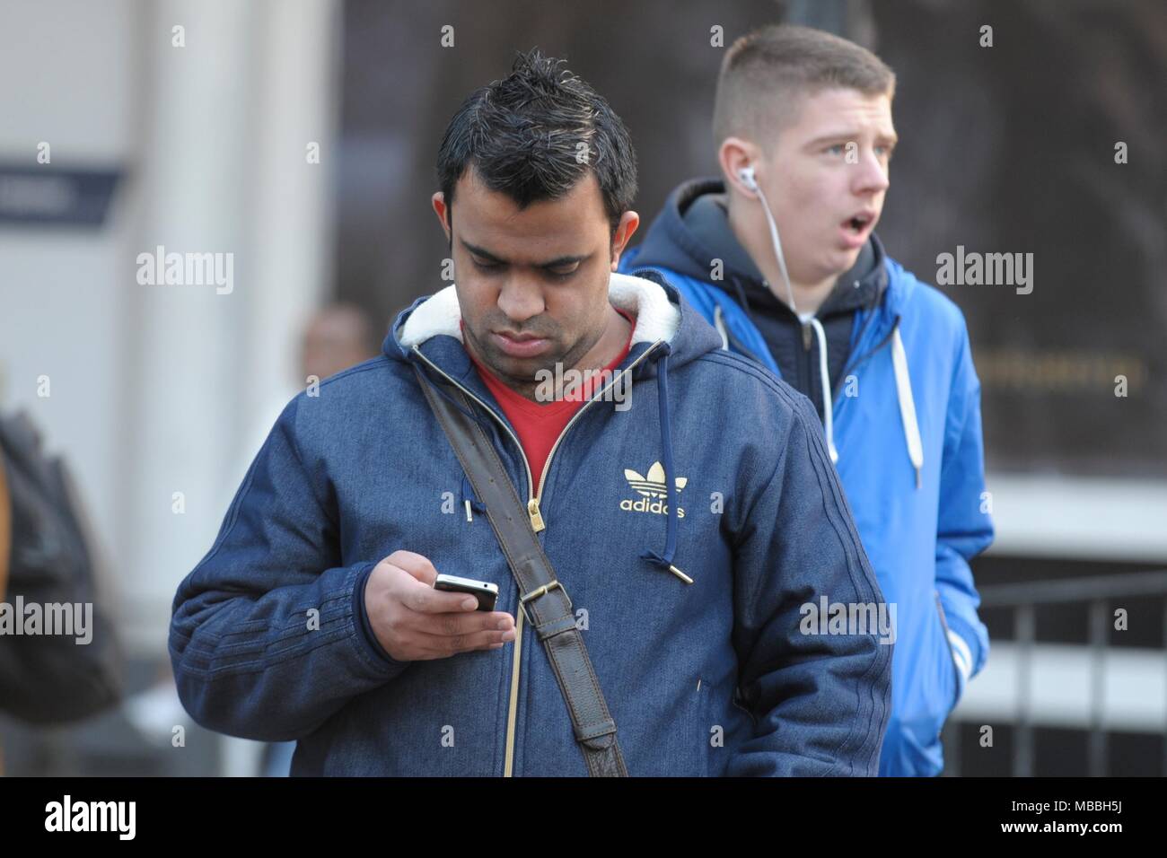 People on their cellphones Stock Photo - Alamy