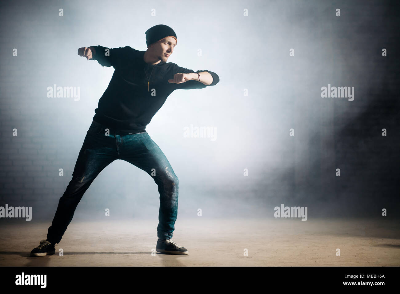 man standing on position for struggle with clenched fists Stock Photo ...