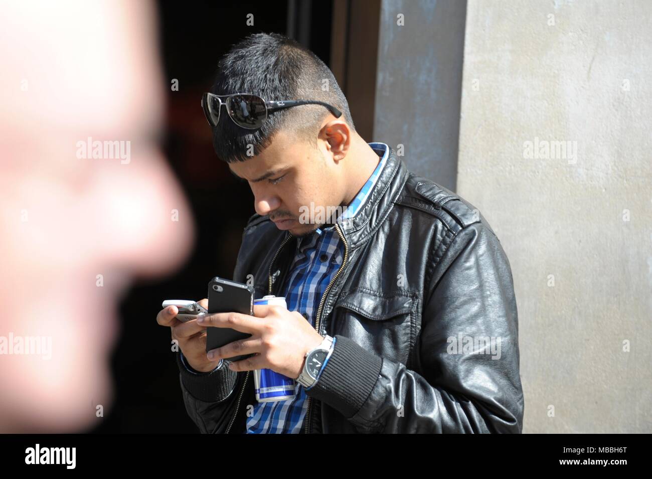 People on their cellphones Stock Photo - Alamy